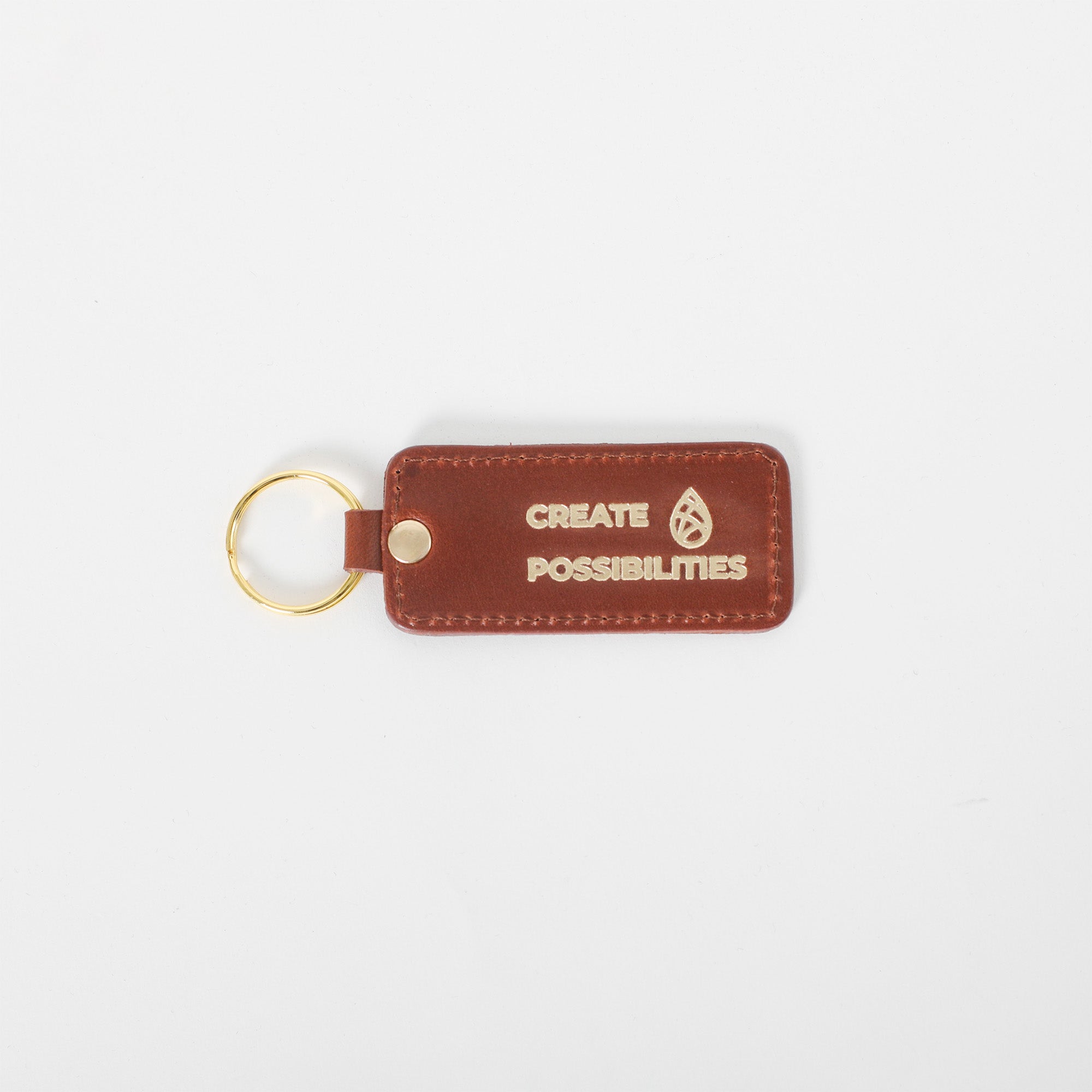 "Create Possibilities" Embossed Leather Keychain – Unshattered